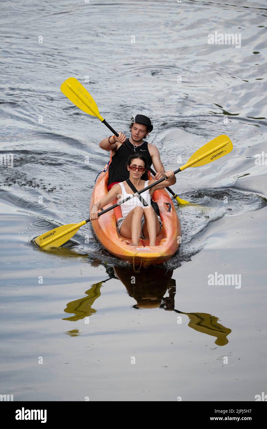 Austin Texas USA, August 14, 2022: Two people paddling in a kayak enjoy ...