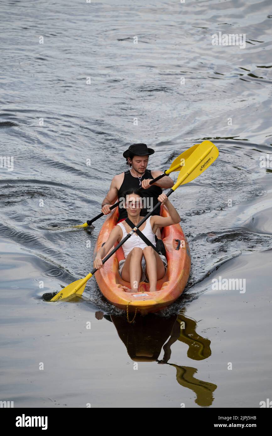 Austin Texas USA, August 14, 2022: Two people paddling in a kayak enjoy ...