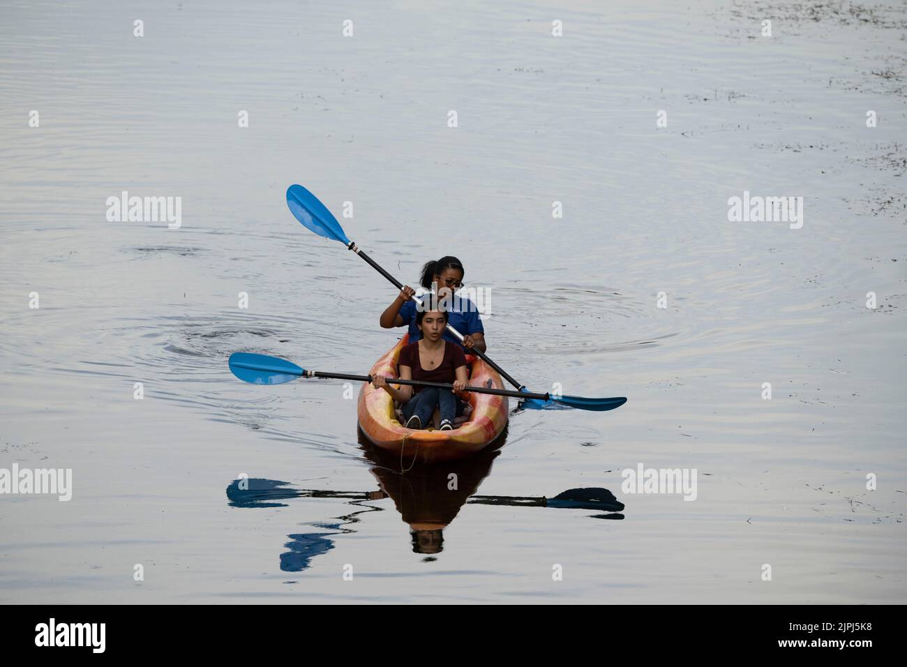 Austin Texas USA, August 14, 2022: Two people paddling in a kayak enjoy ...