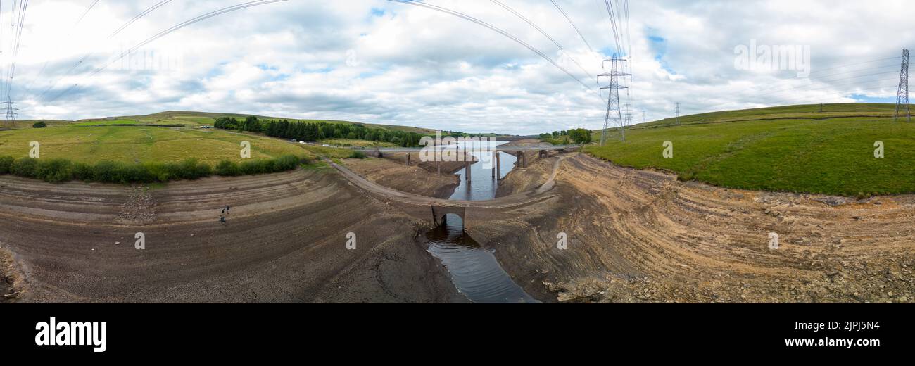 An old bridge is revealed during at Baitings Reservoir during one of ...