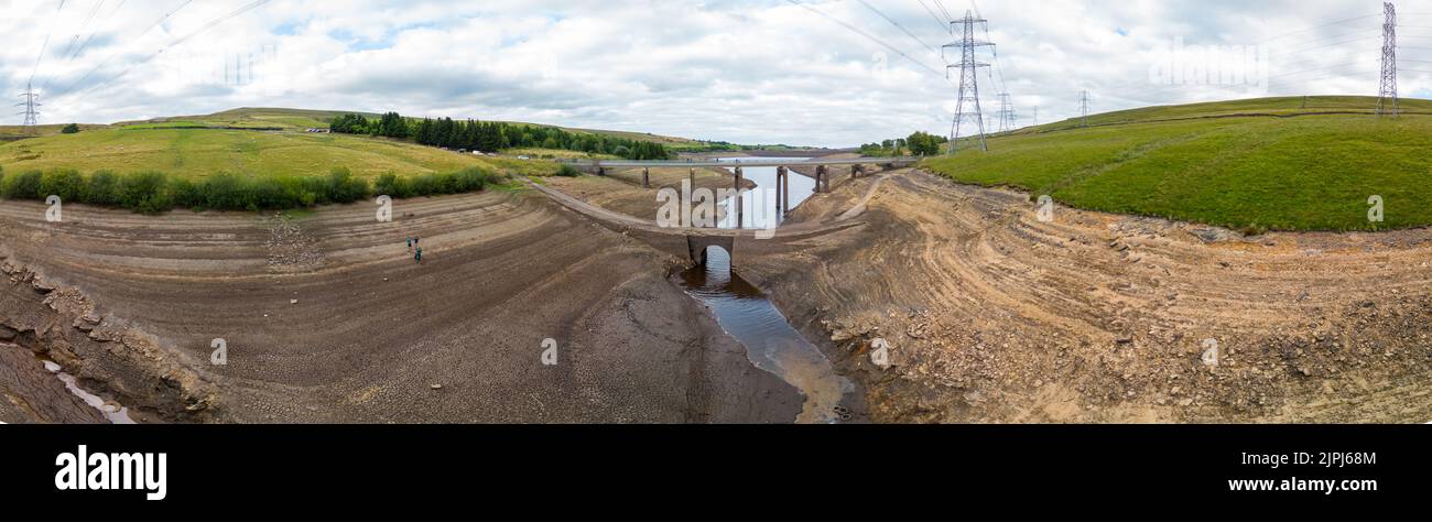 An old bridge is revealed during at Baitings Reservoir during one of ...
