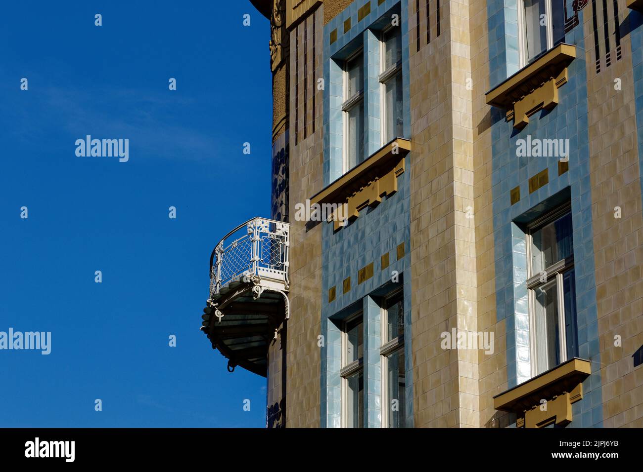 Photo of building with tiled facade Stock Photo - Alamy