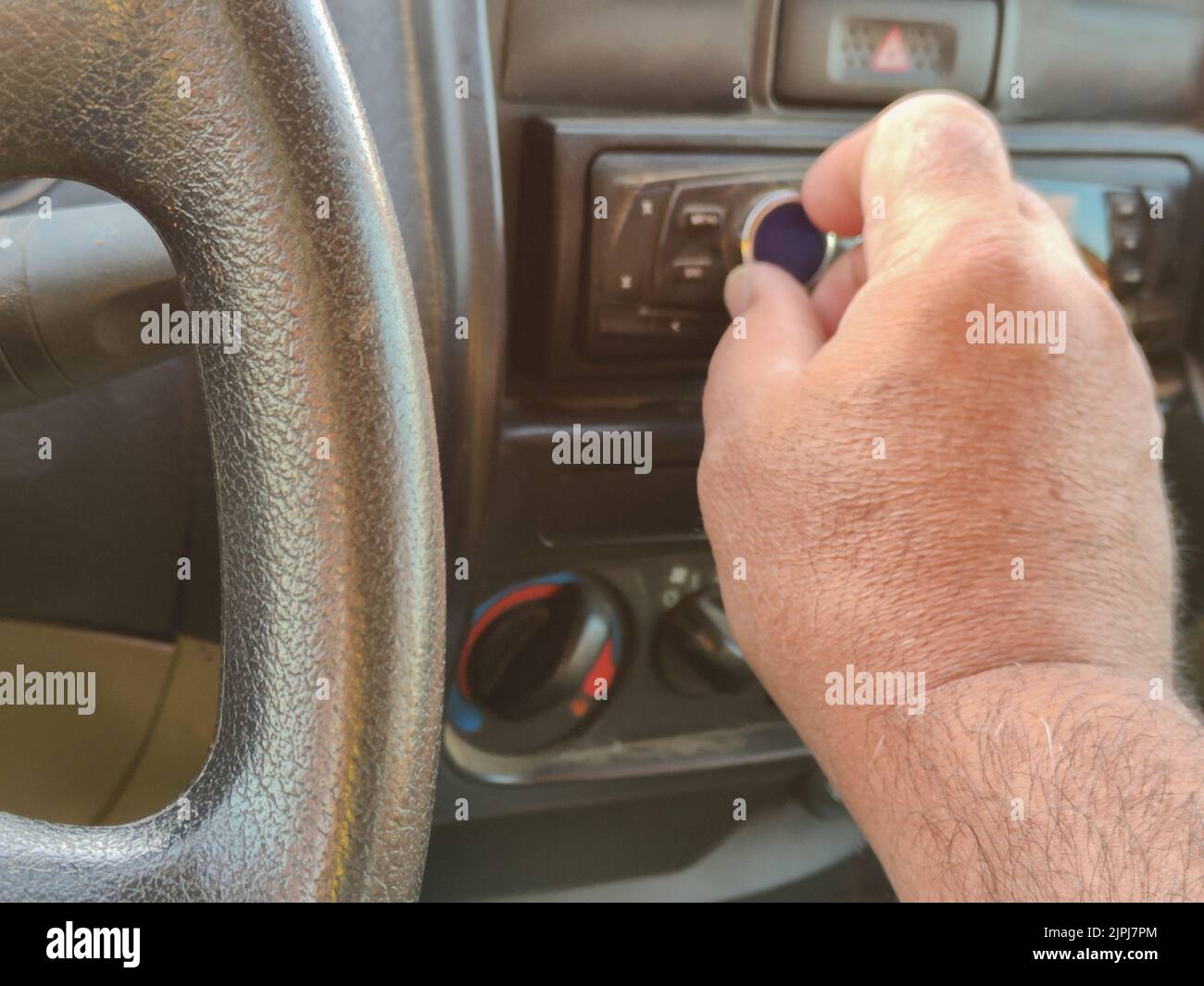 Man using car switch panel hi-res stock photography and images - Alamy