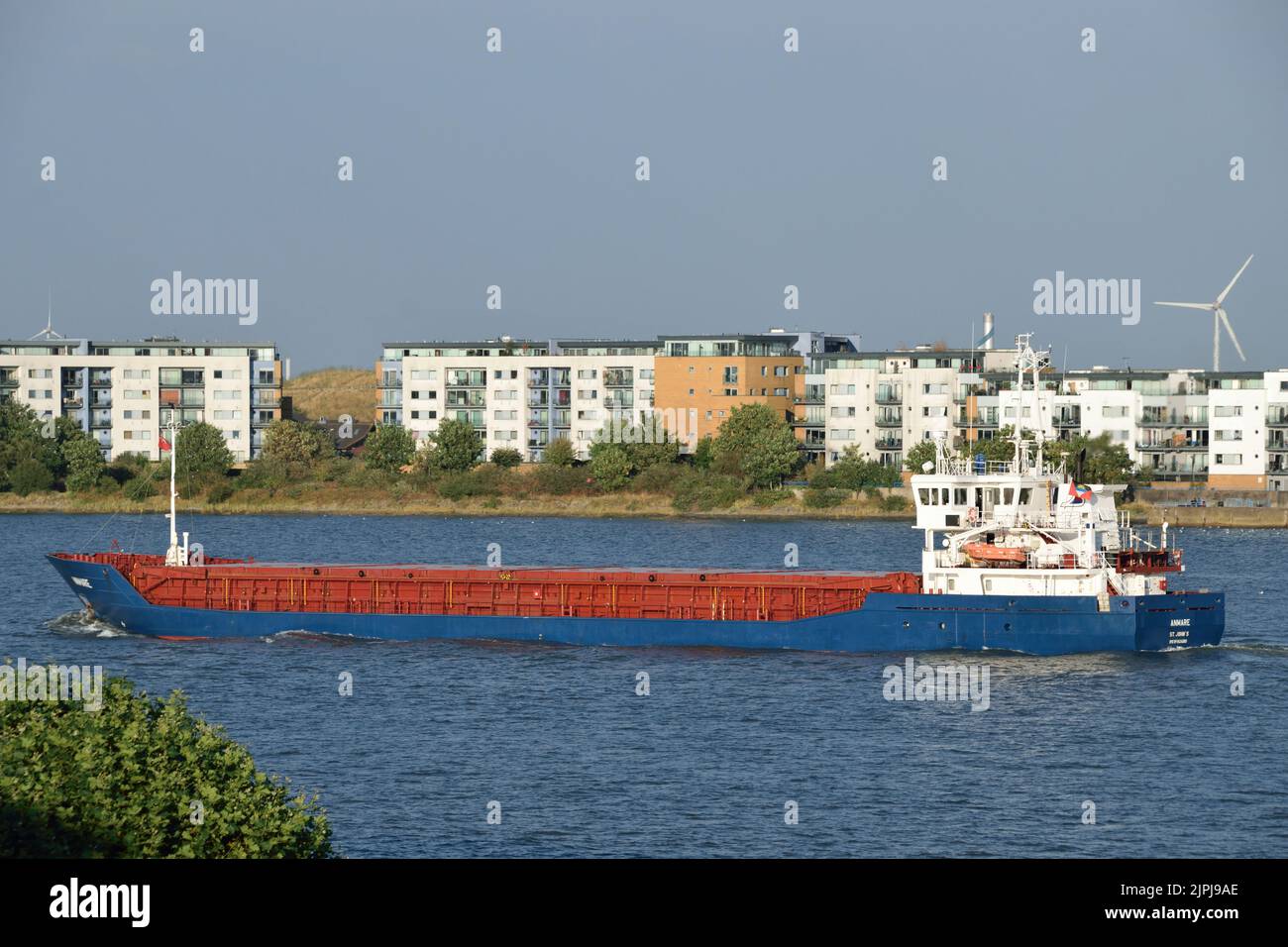 Cargo ship ANMARE heads down the River Thames after collecting a cargo ...