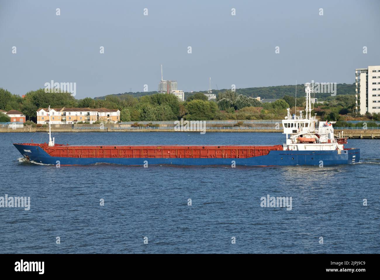 Cargo ship ANMARE heads down the River Thames after collecting a cargo ...