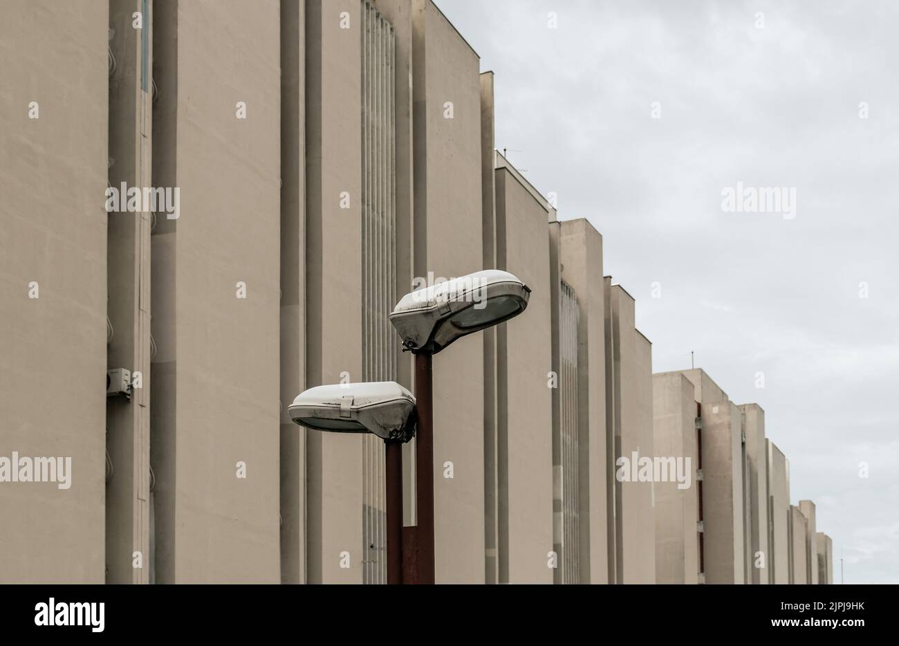 Brutalist concrete architecture of the residential area with street ...