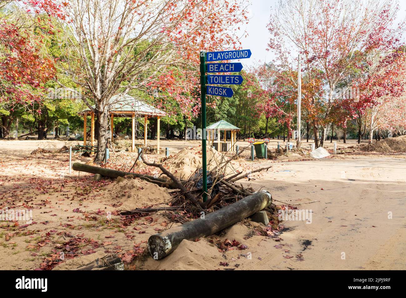 Photograph of damage in a recreational park and pagodas after flooding ...