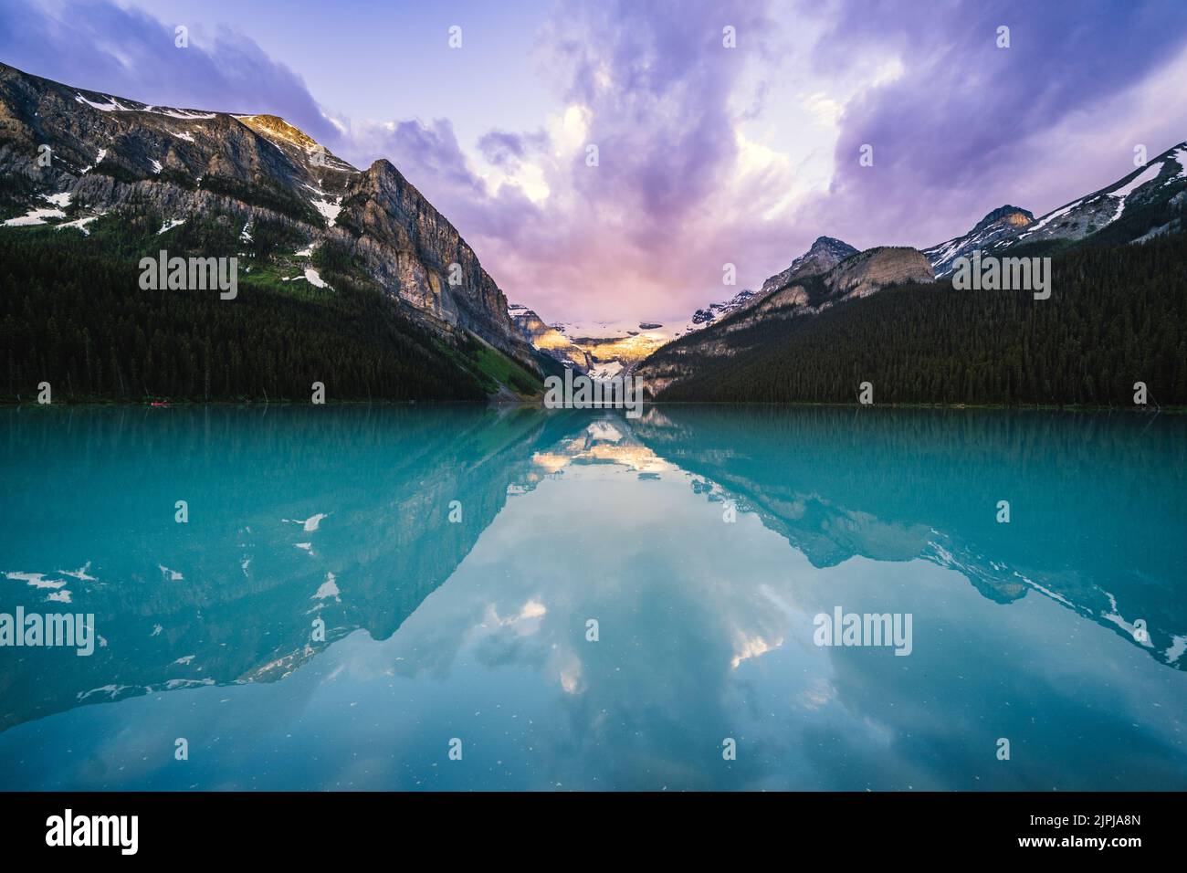Lake Louise in Banff National Park at sunrise in summer Stock Photo - Alamy