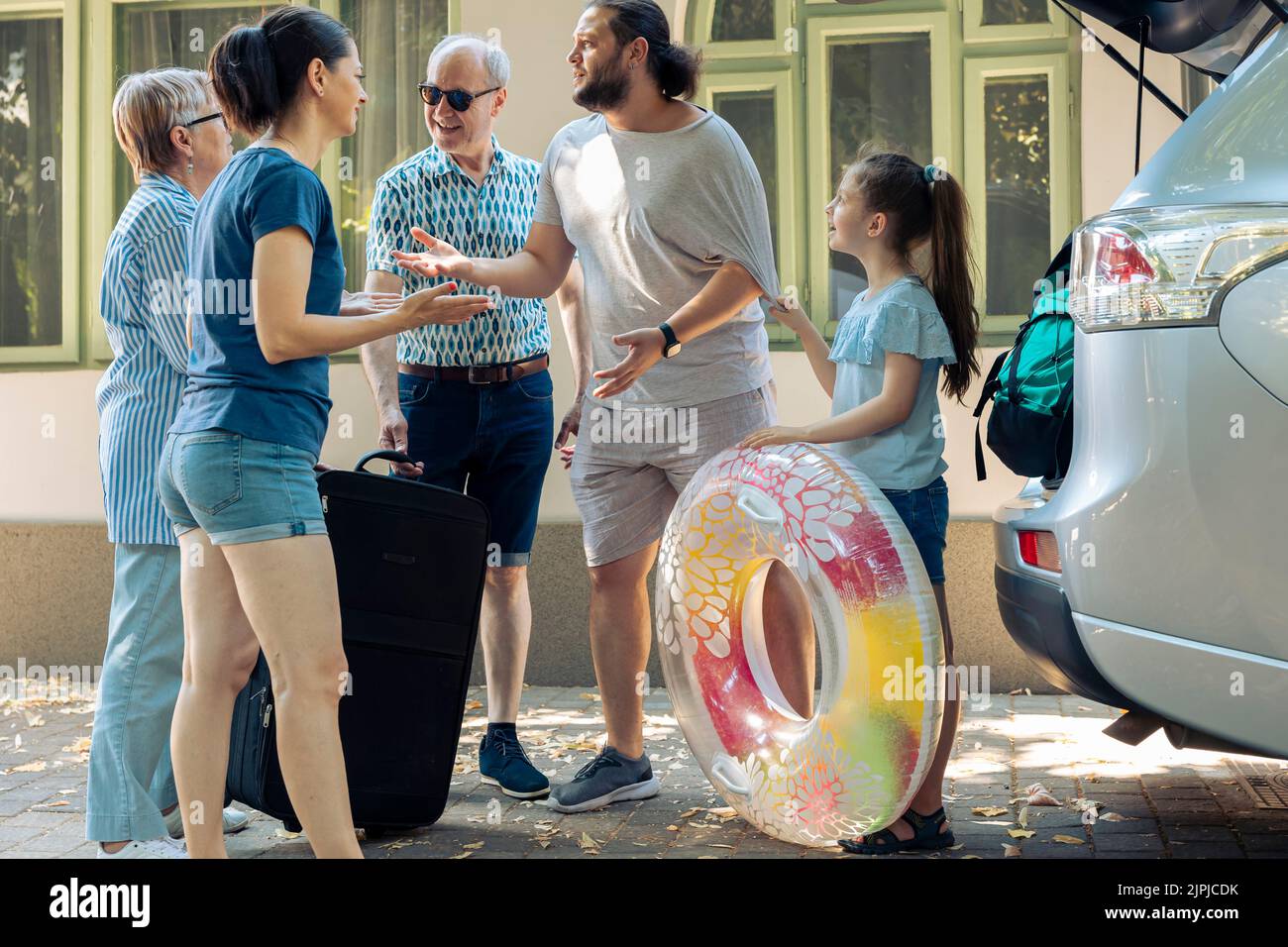 Loading luggage small car hi-res stock photography and images - Alamy