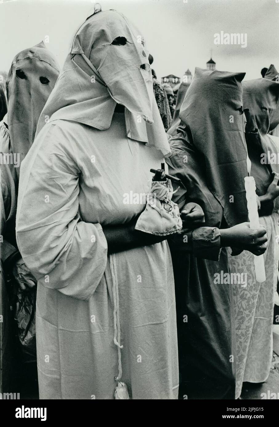 Robed penitents taking part in an Easter Holy Week or Semana Santa ...