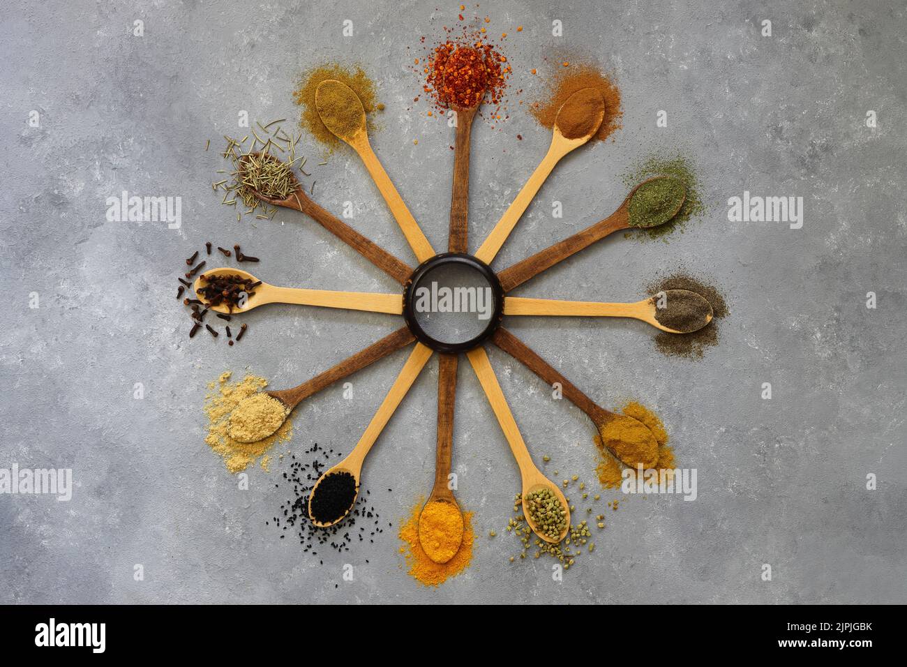 Different kind of spices on a wood background. Big set of Indian spices ...