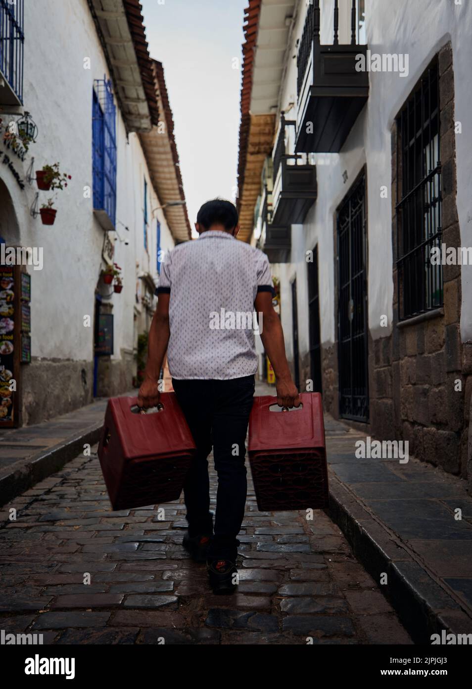 Man between two buildings building hi-res stock photography and images ...