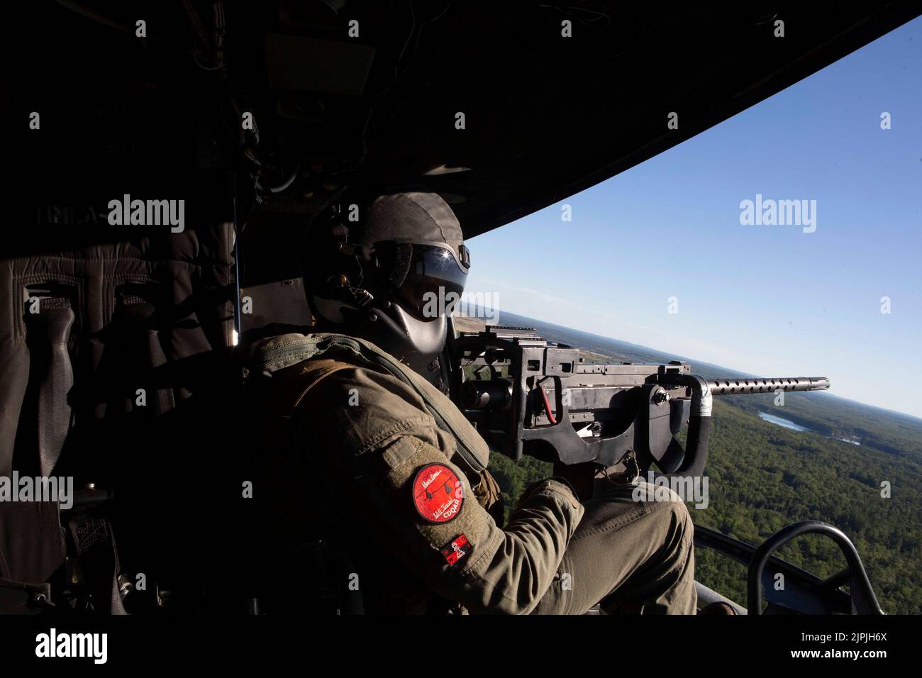 U.S. Marine Corps Sgt. Timothy Rustin, a UH-1Y Venom crew chief with ...