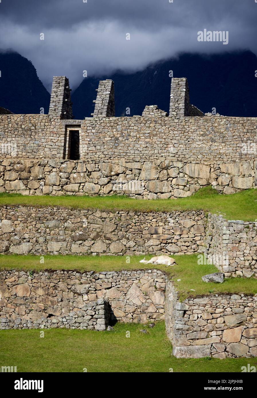 A vertical shot of the famous world wonder Inca ruins of Machu Picchu ...