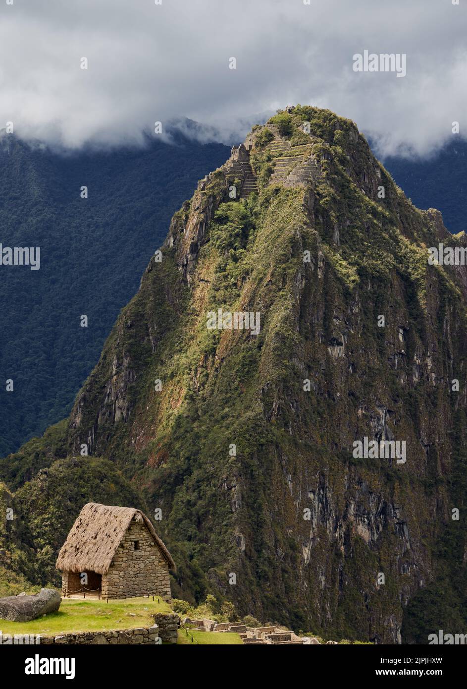 A vertical shot of the famous world wonder Inca ruins of Machu Picchu ...