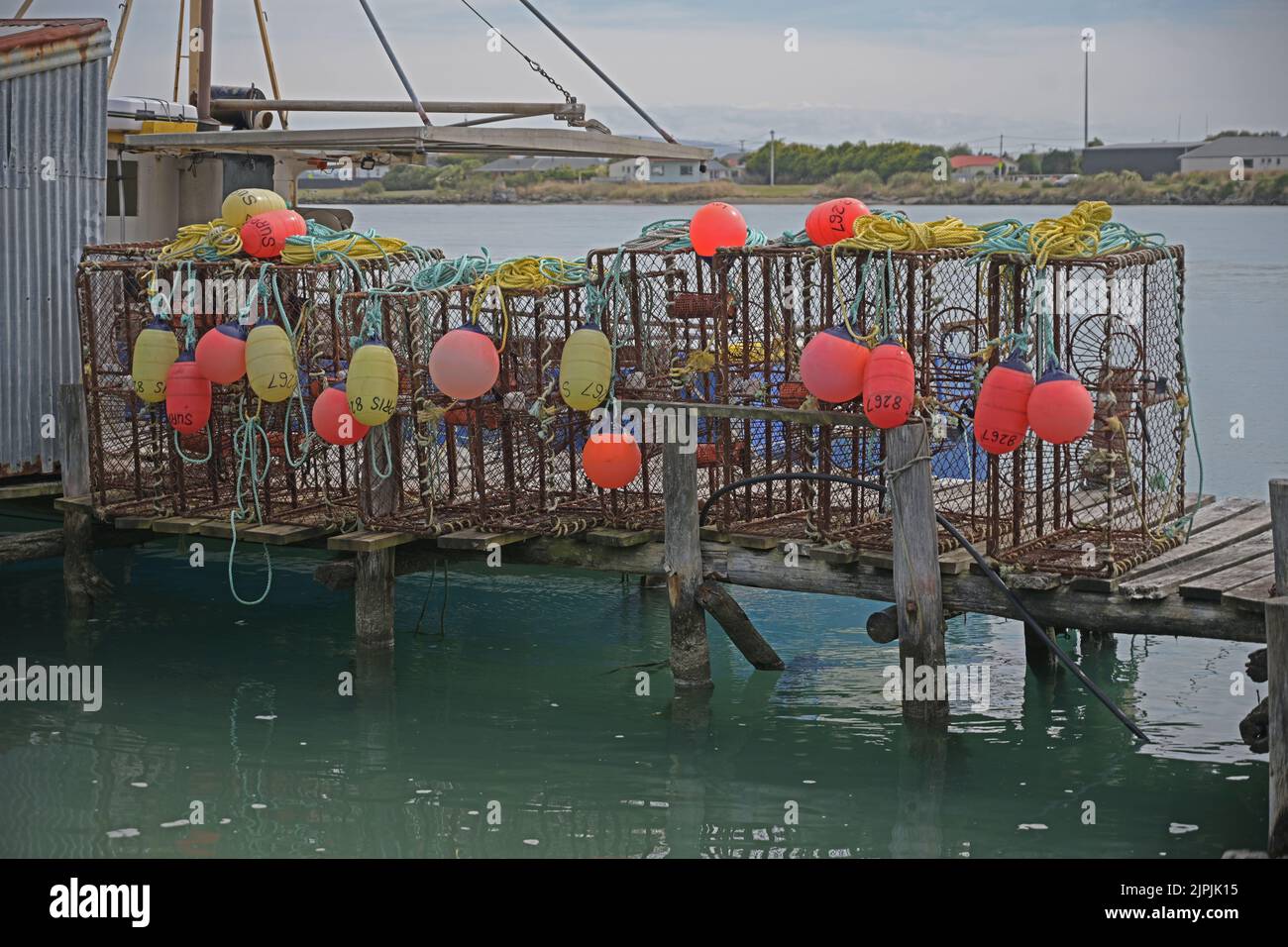 Cray or Lobster fishing pots on a wharf ready to be used, the bright ...