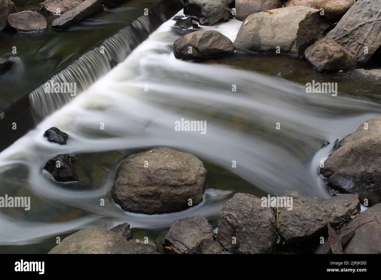 Beautiful Minnehaha falls long exposure of water flowing on a sunny ...