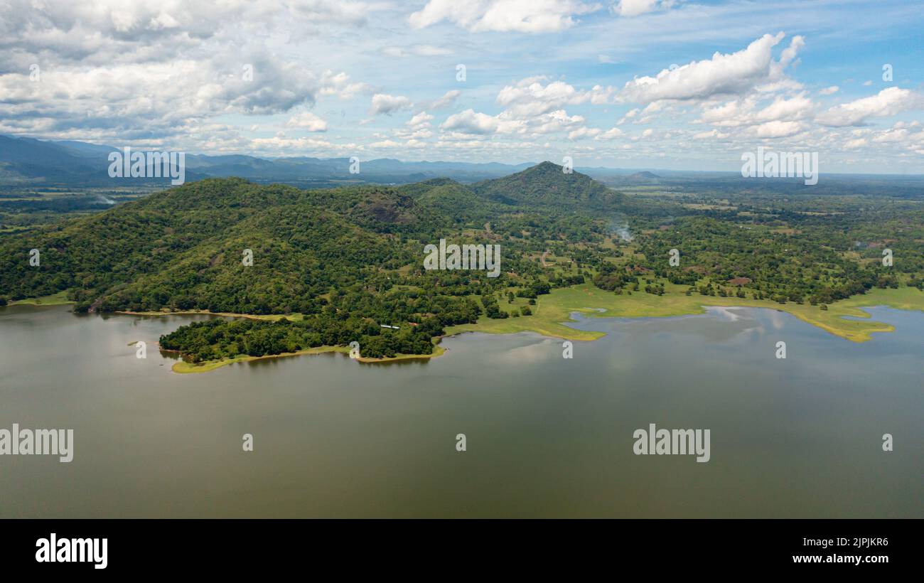 Top view of lake and valley with tropical forest. Sorabora lake, Sri ...