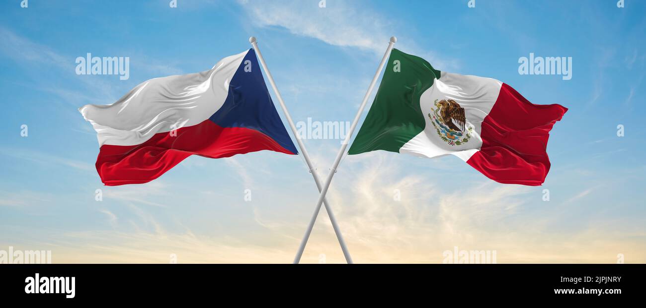 two crossed flags Mexico and Czech republic waving in wind at cloudy ...