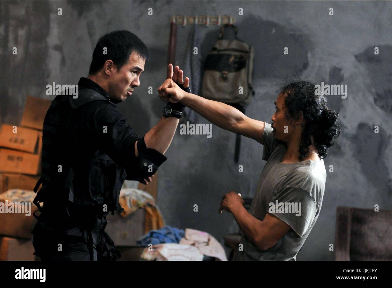 JOE TASLIM, YAYAN RUHIAN, THE RAID, 2011 Stock Photo - Alamy