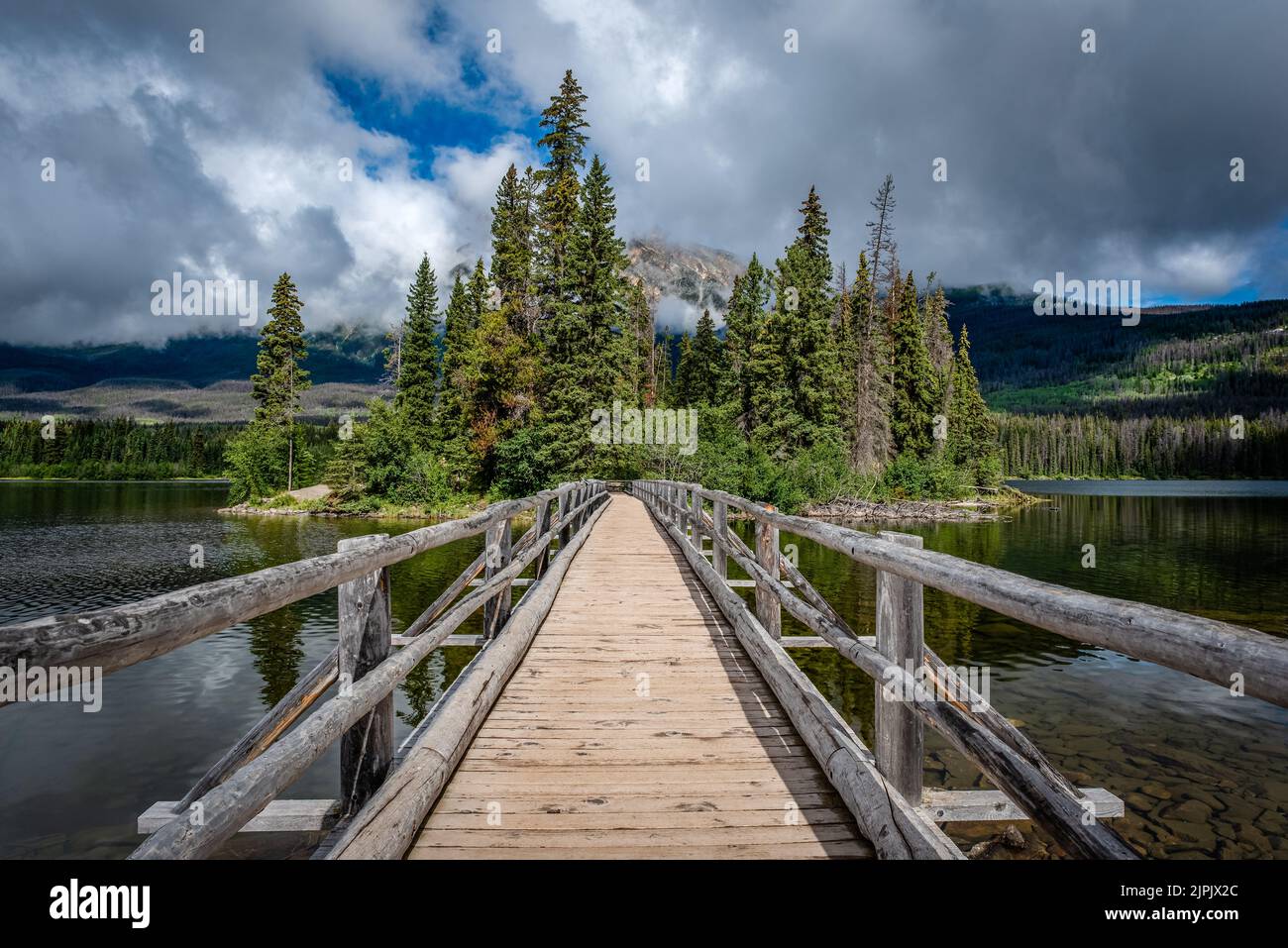 Blue sky appearing through low clouds over the Pyramid Lake Island ...
