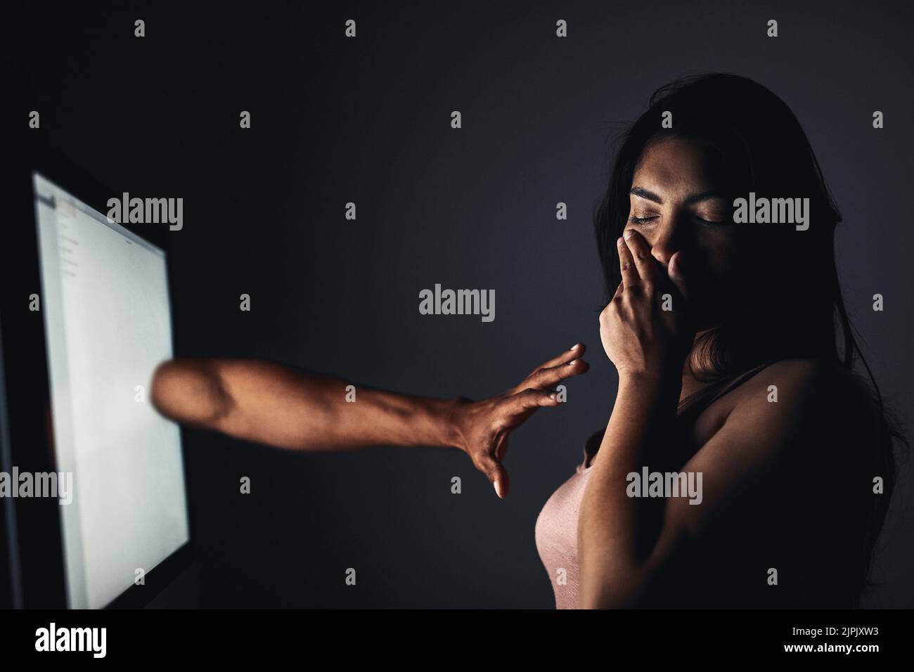 Anyone can become a victim of cyberbullying. a hand extending from a ...