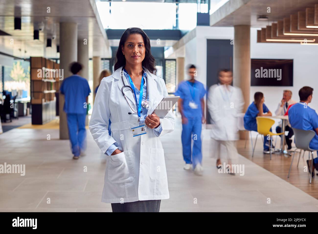 Female doctor name tag hi-res stock photography and images - Alamy