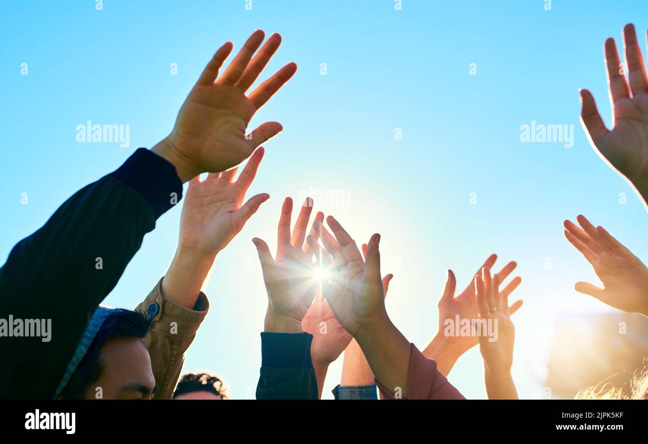The hands of victory. a group of unrecognizable peoples hands outside ...