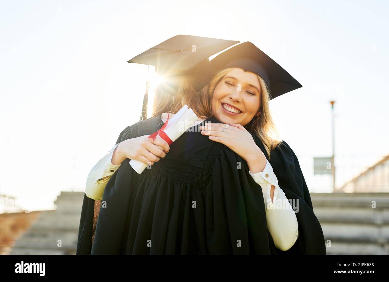 Im so happy to have made this journey with you. two students hugging ...