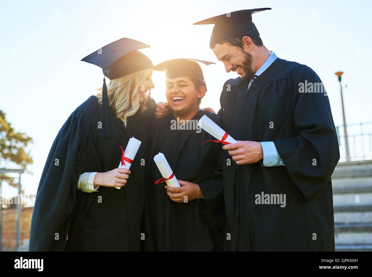 The future never looked more promising. a group of students holding ...
