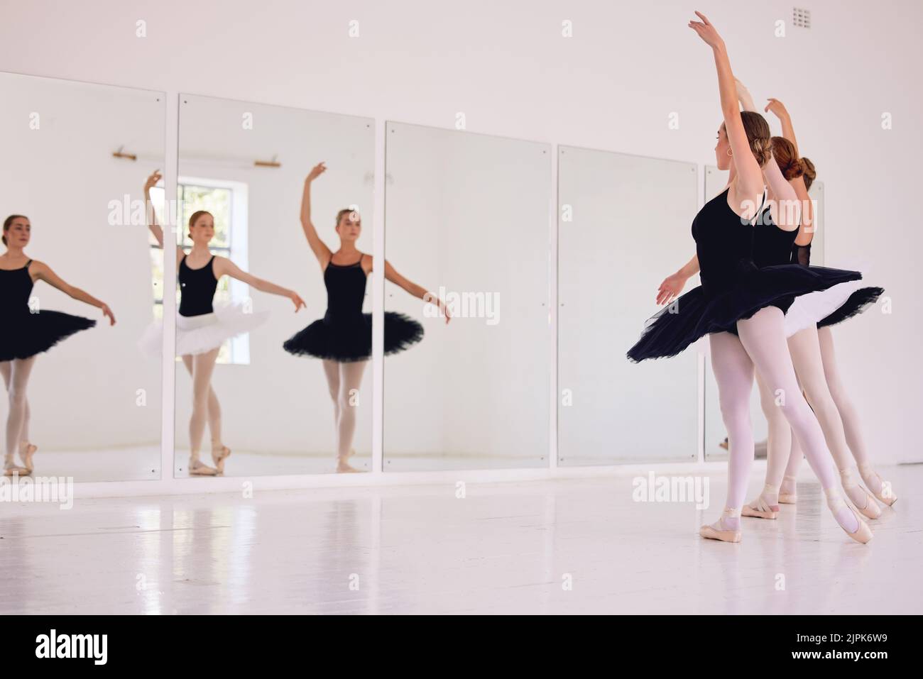 Ballerinas dancing or practicing in a dance studio or class ready for a ...