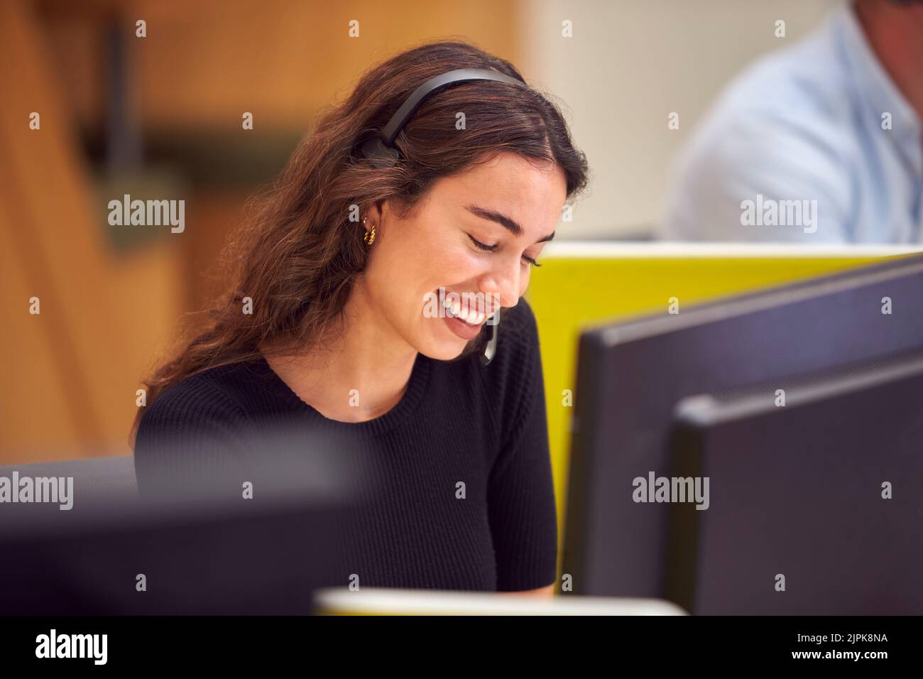 Laughing At A Call Center Employees