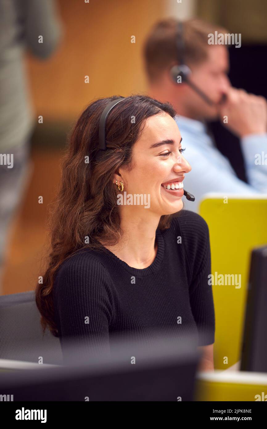 Customer service laugh woman hi-res stock photography and images - Alamy