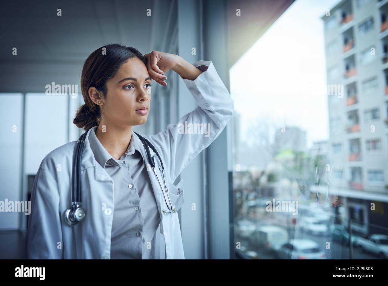 Shes been under a lot of stress lately. a young female doctor looking ...