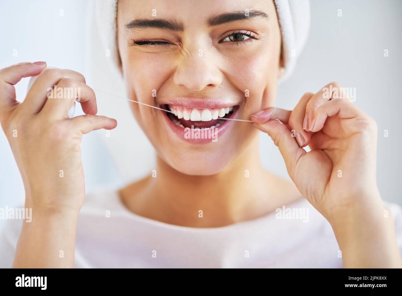 Go the extra mile for your smile. Portrait of a beautiful young woman ...