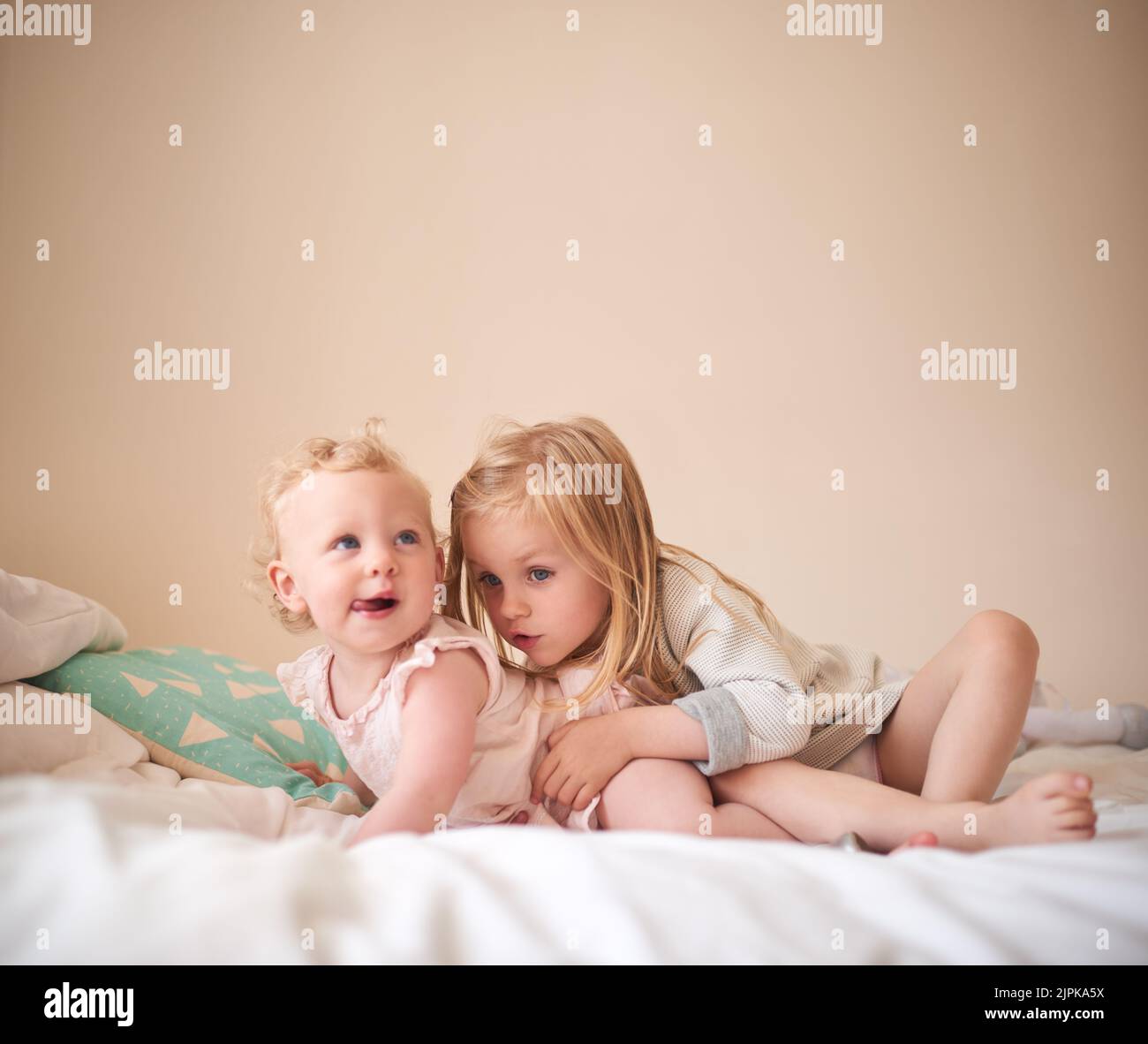 Big sis will always be there to protect you. two adorable sisters ...