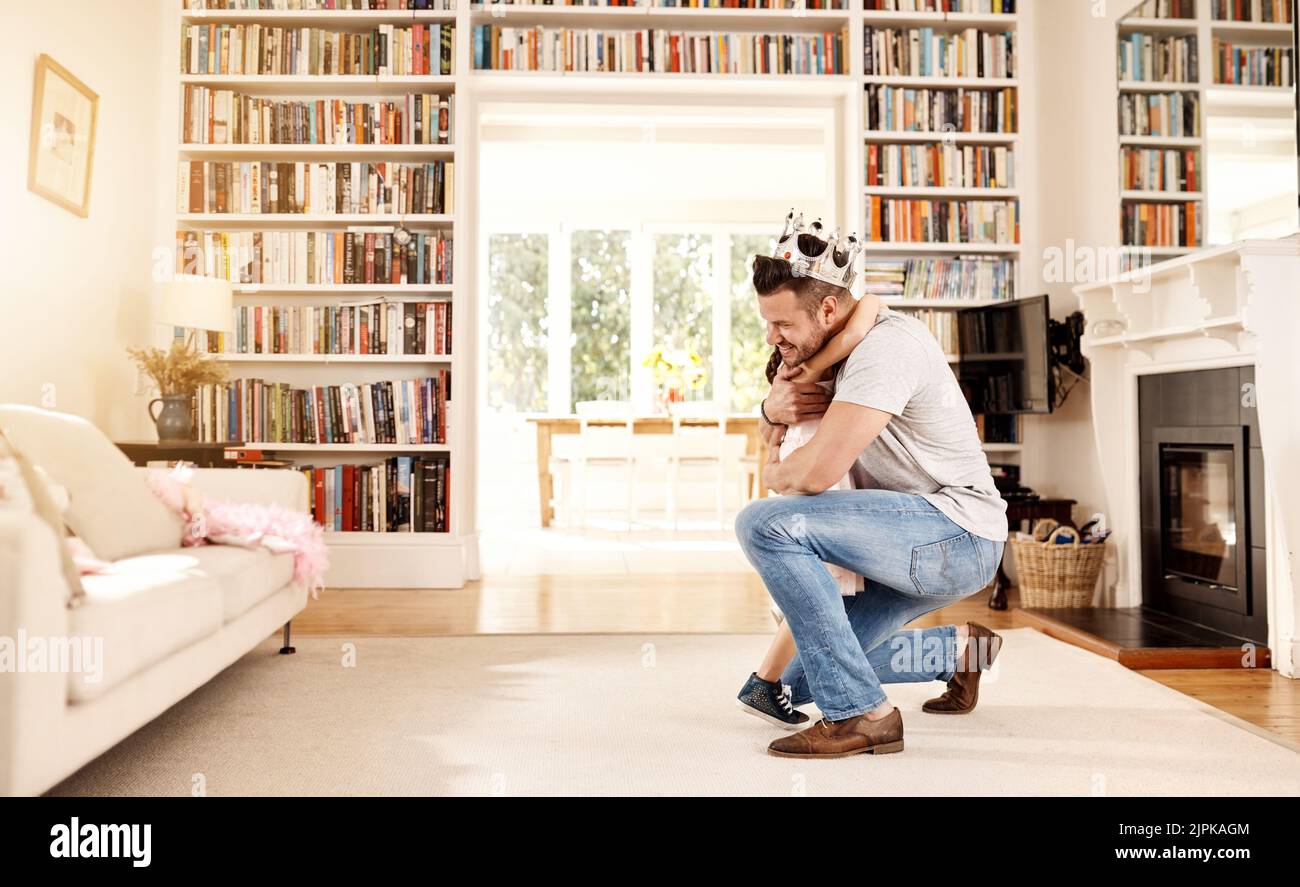 Come here for a big hug, my princess. a father hugging his little ...