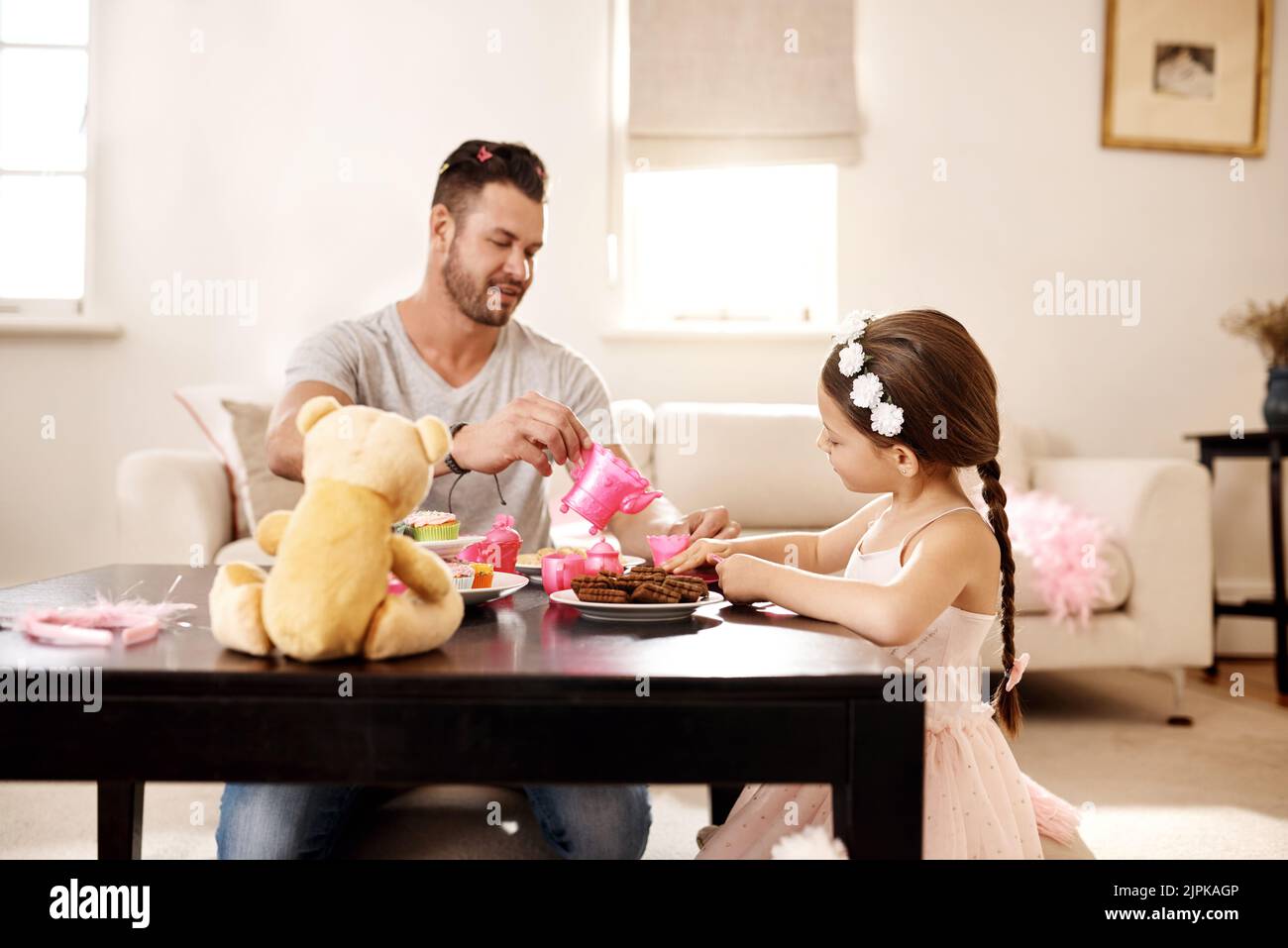 Dads having tea with a princess. a father and his little daughter ...