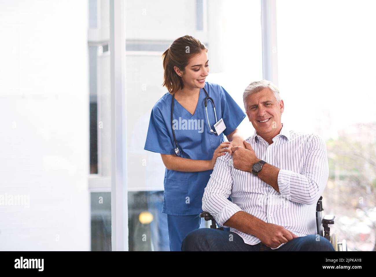 Doctors who really care. Portrait of a cheerful young female doctor ...