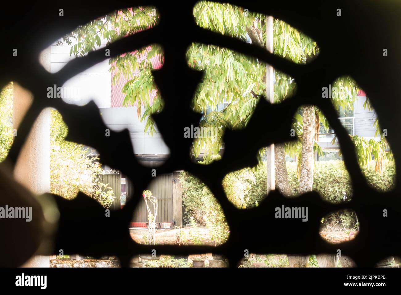 Outside View Through Carved Wooden Window Stock Photo - Alamy