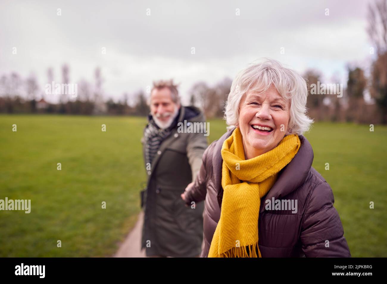 walk, holding hands, older couple, walks, older couples Stock Photo - Alamy