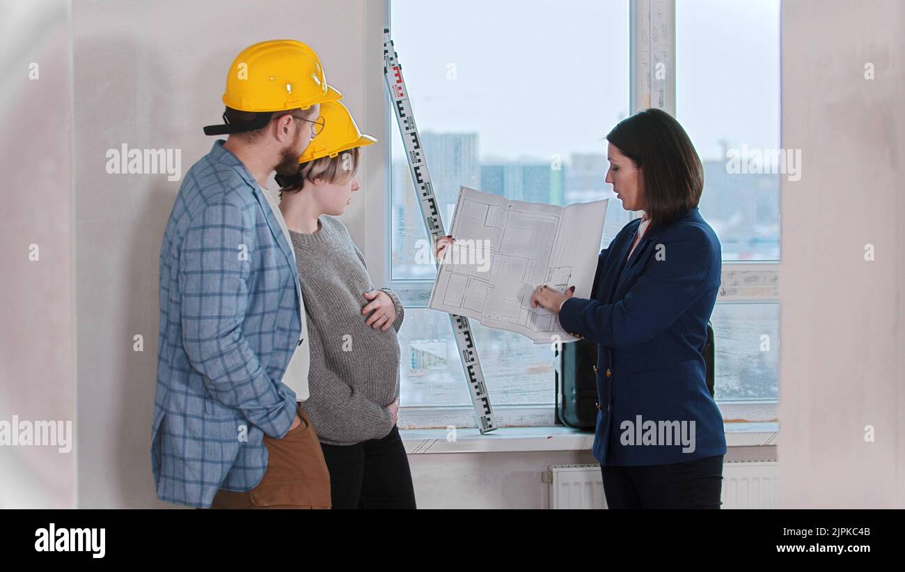 Real estate agent showing layout hi-res stock photography and images ...