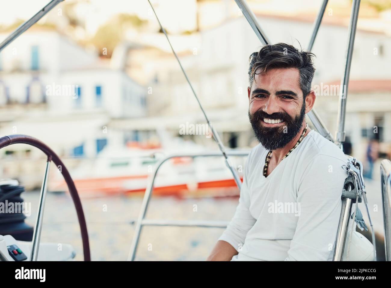 I just cant miss a beautiful sunset. a handsome mature man on his yacht ...