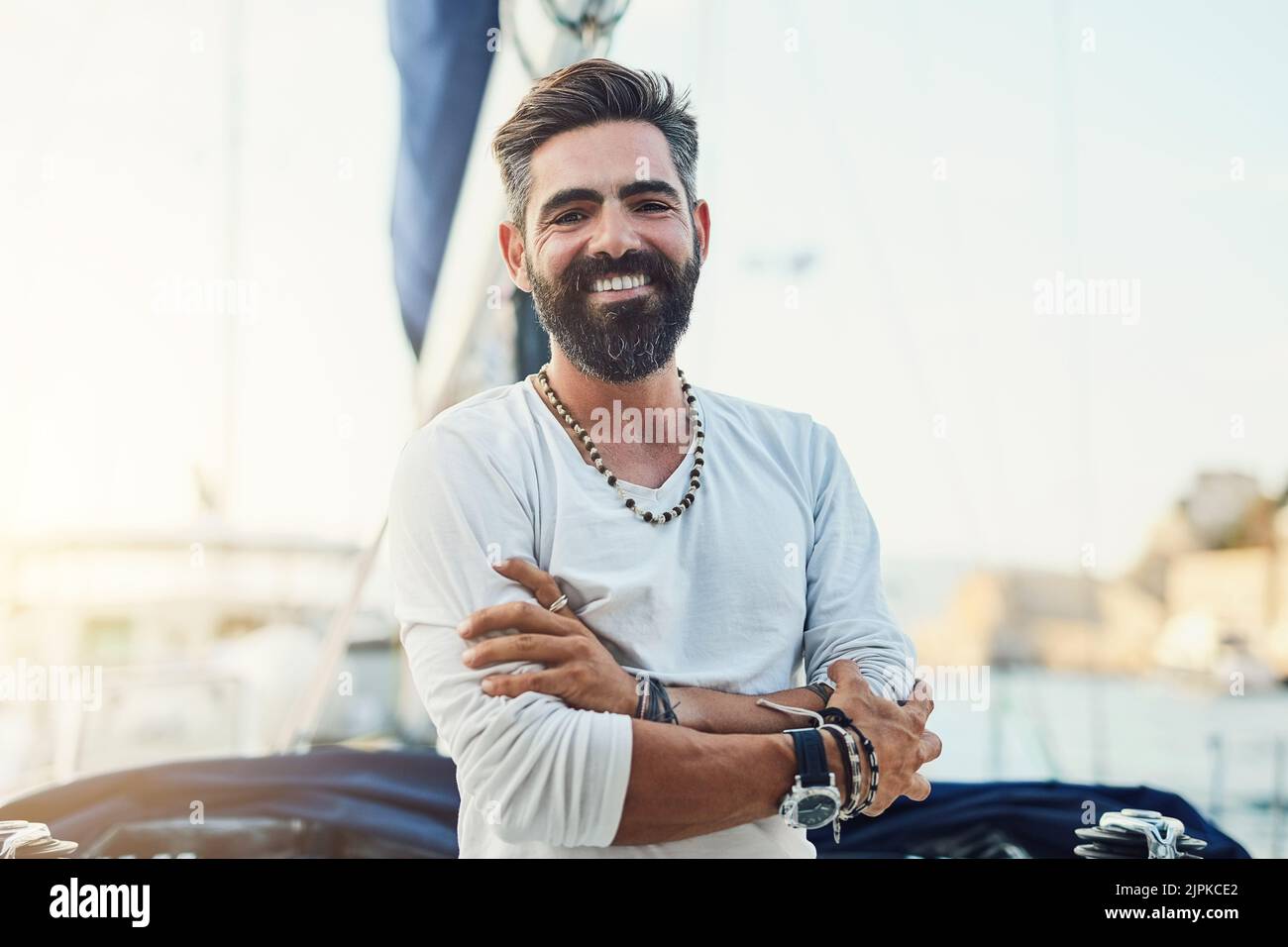 I love the smell of the ocean. a handsome mature man on his yacht Stock ...