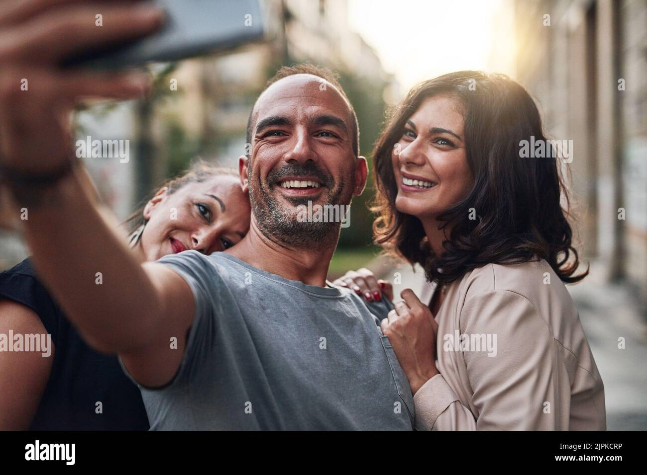 Selfie With My Closest Friends Three Friends Taking A Selfie While Enjoying Themselves Out In