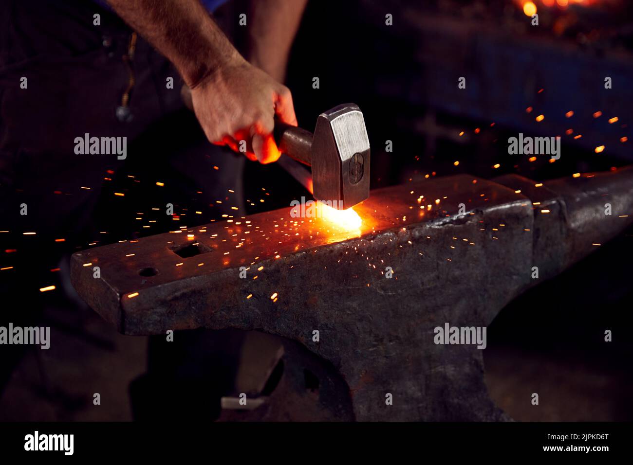 Holding blacksmiths hammers hi-res stock photography and images - Alamy