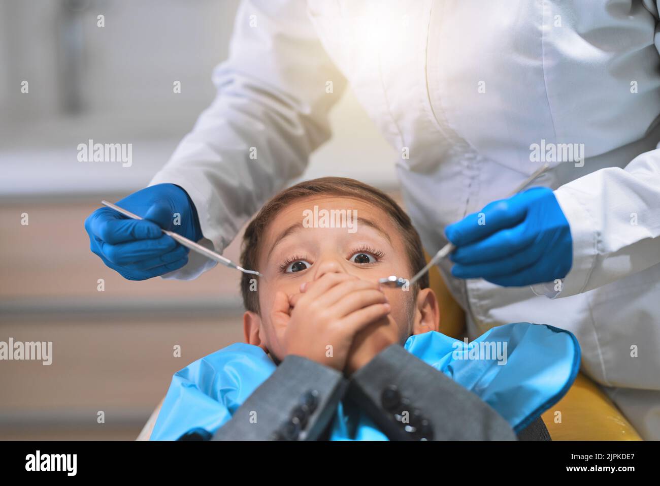 How am I going to get out of this. a frightened little boy lying down ...