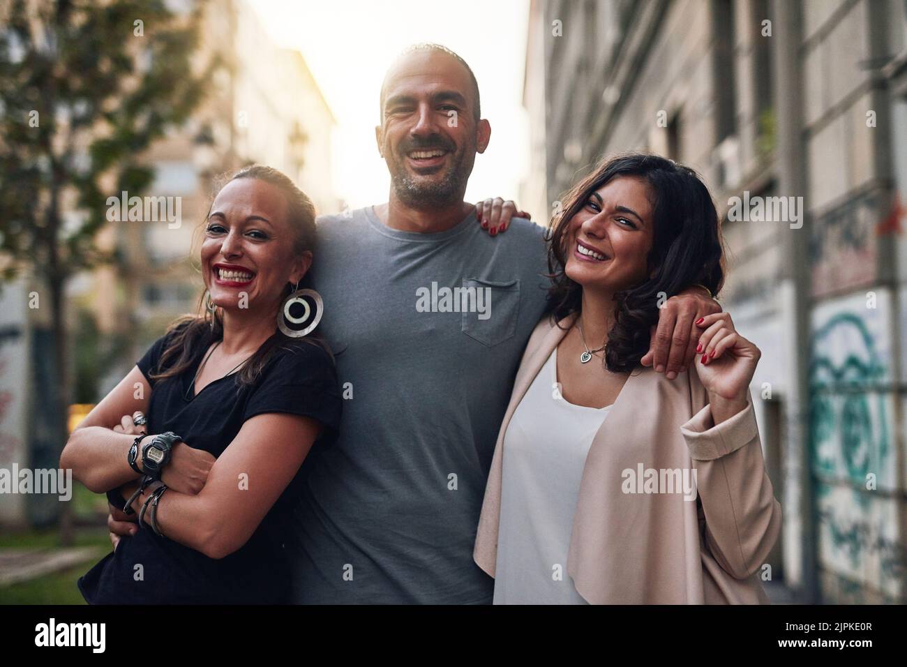 Were as close as friends get. three friends having fun while out in the ...