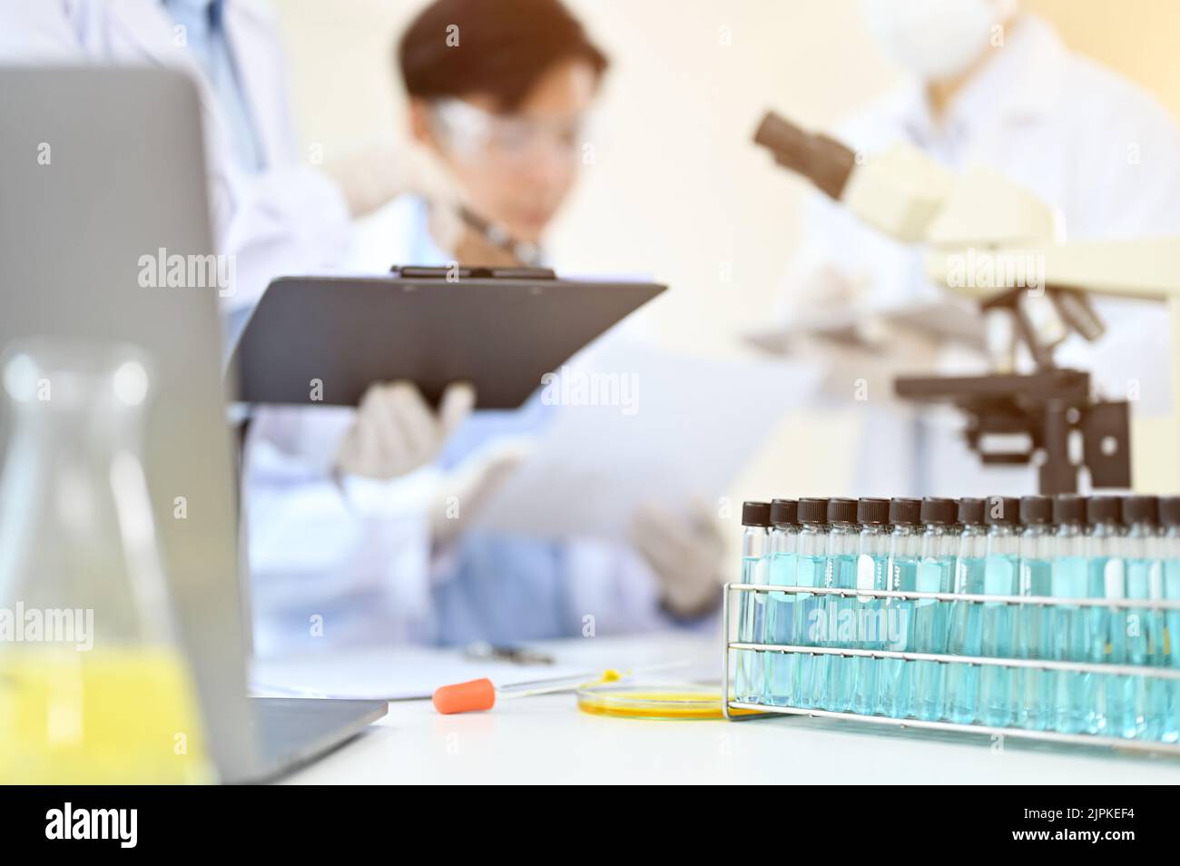Advanced equipments on the table with blurred background of a group of ...