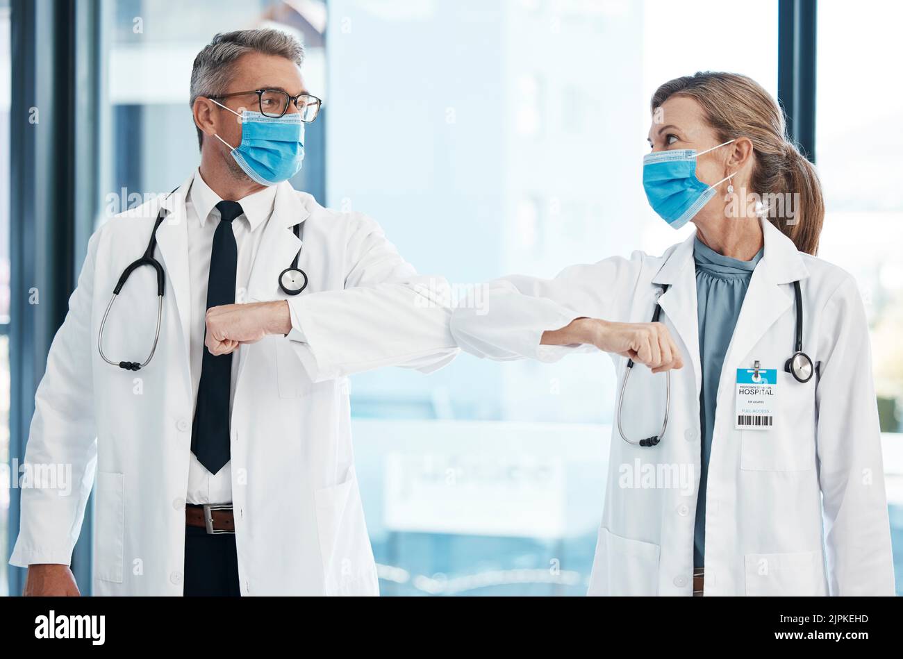 Elbow greeting, doctors and medical healthcare workers with covid 19 ...